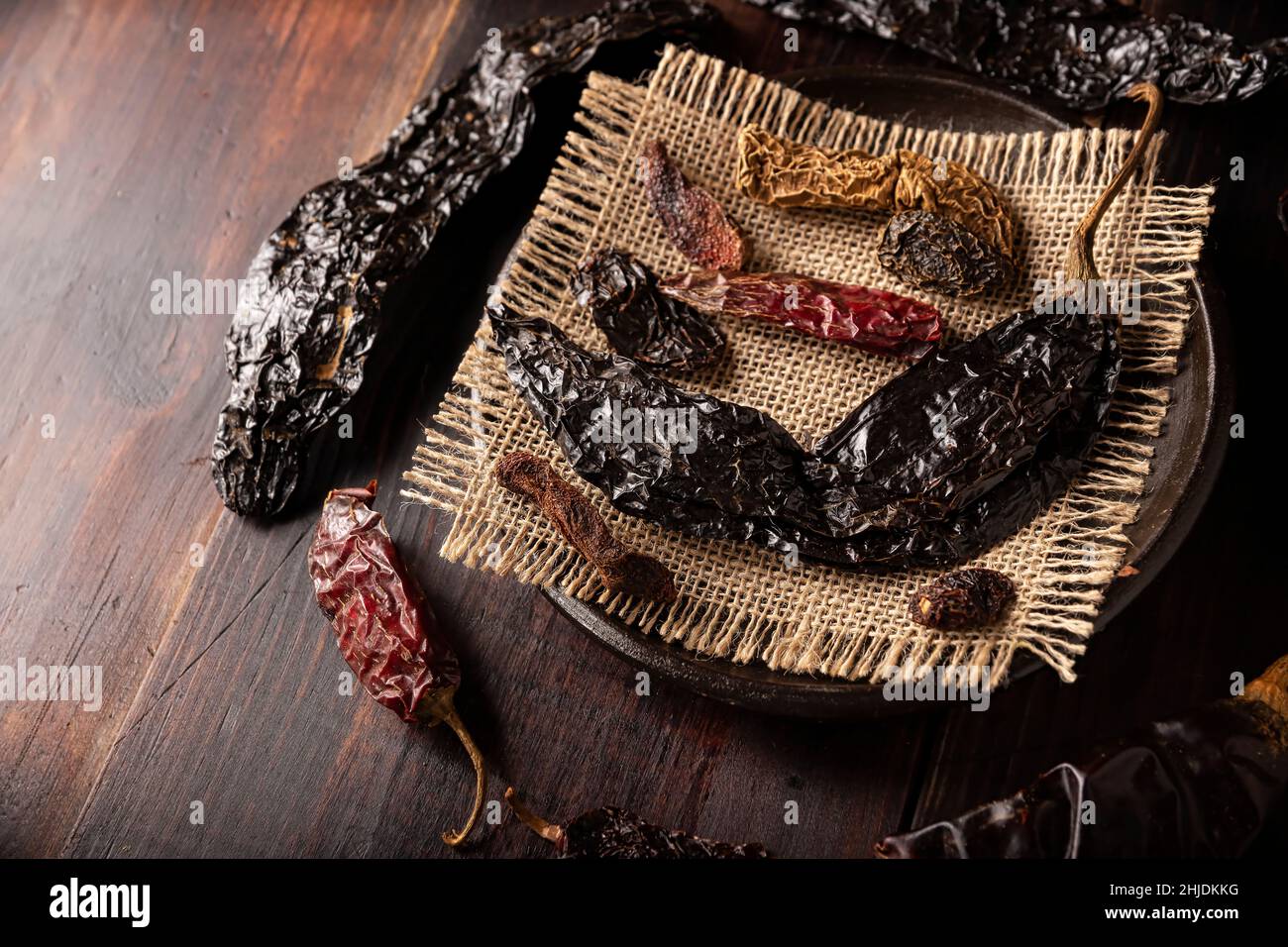 Variety of mexican dried chili. Chile Morita, Guajillo, sChipotle and ...