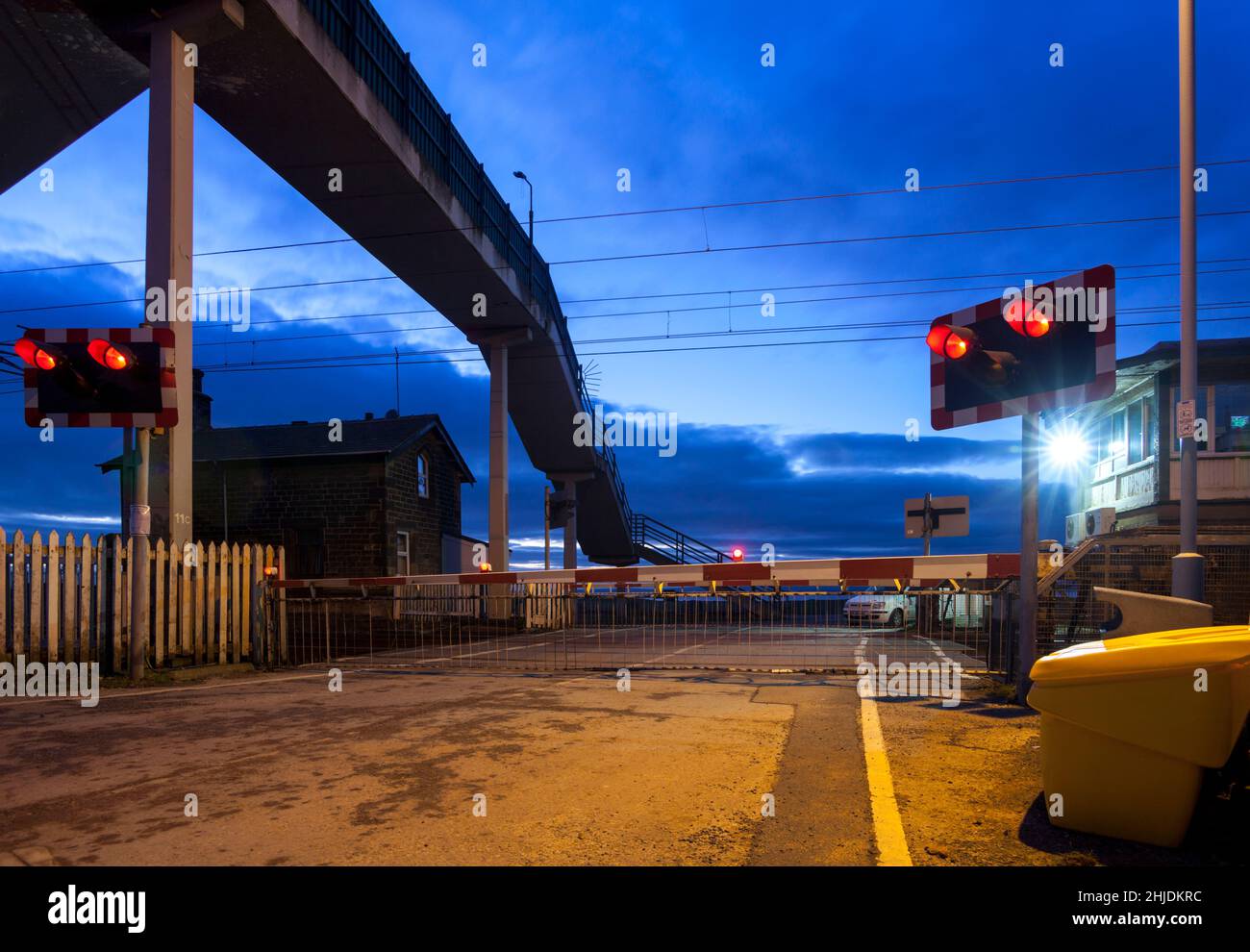 Hest Bank Level crossing with barriers and flashing lights on the west ...