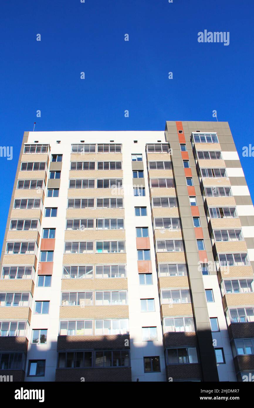 Modern urban architecture, rows of windows reflecting the sky. The ...