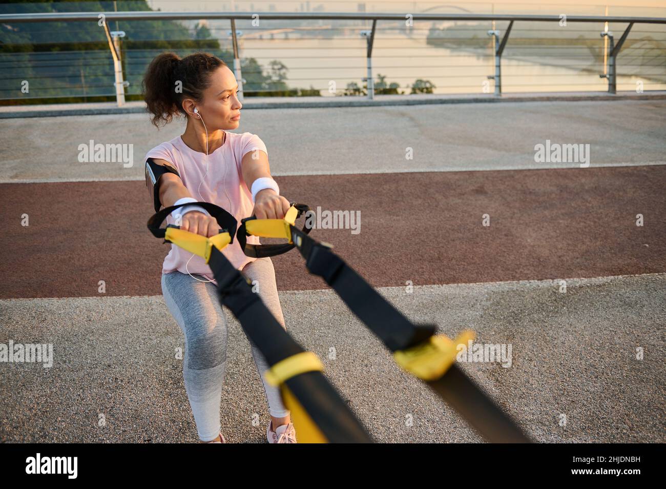 African american woman squatting weight hi-res stock photography and ...