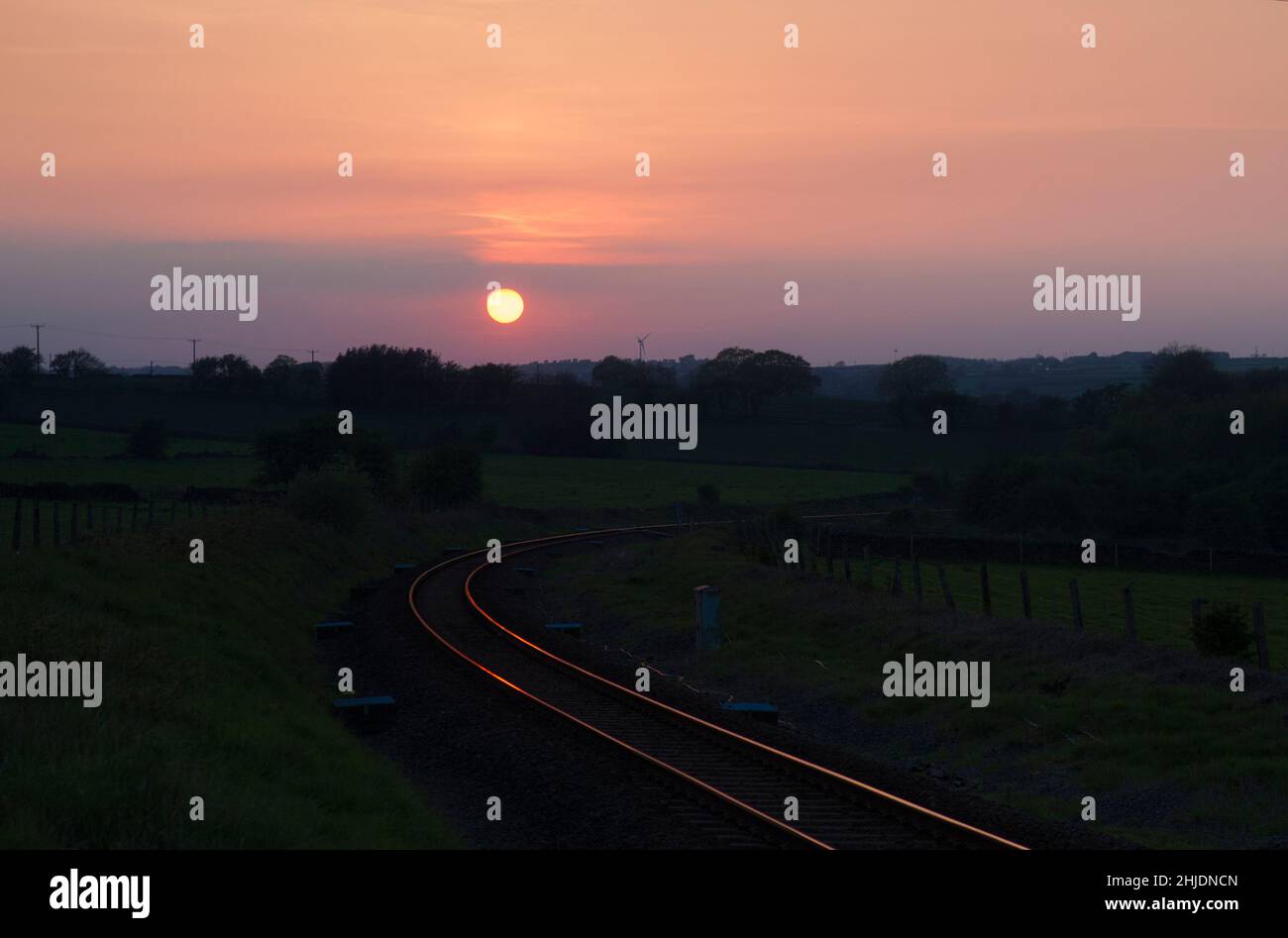sunset over the single track railway line at Ingbirchworth (North of ...