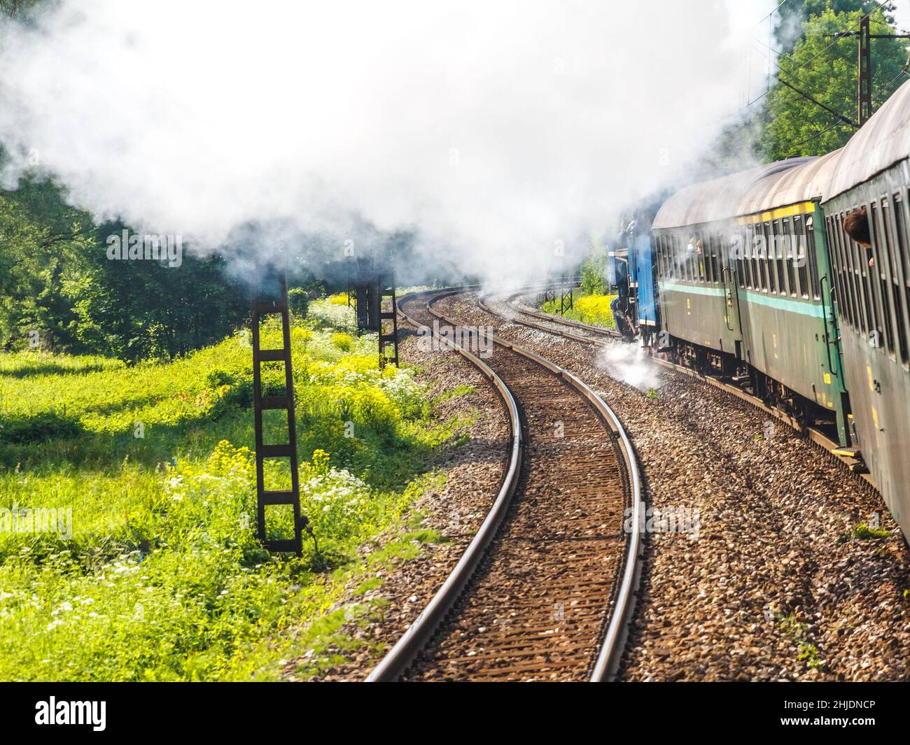 Landscape view from wagon trains hauled by a steam locomotive Stock ...