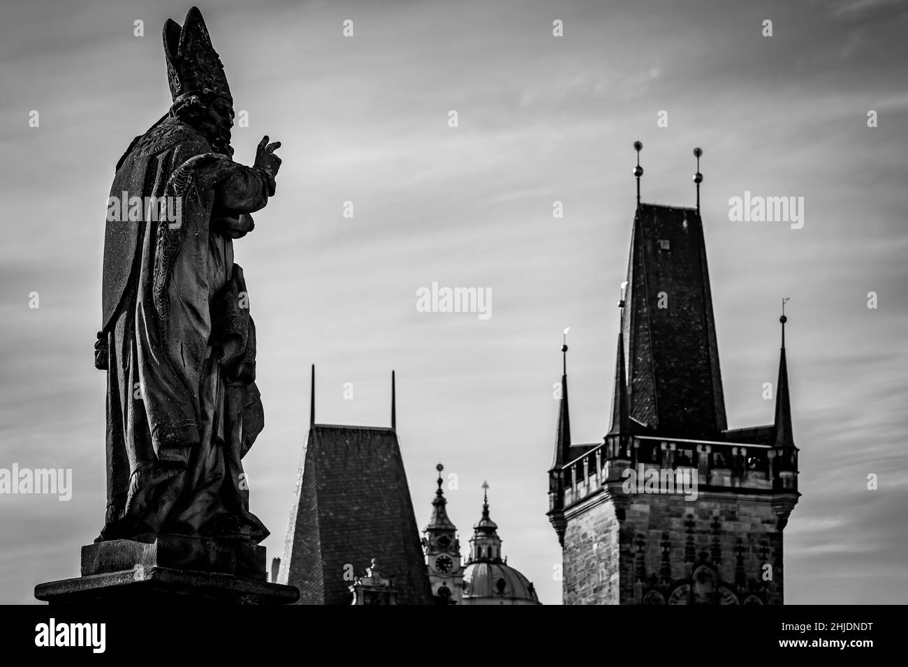 Statue of Adalbert of Prague on Charles Bridge and The Old Town of ...