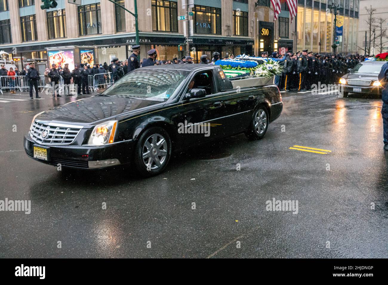 New York, New York, USA. 28th Jan, 2022. The hearse caring the flowers ...