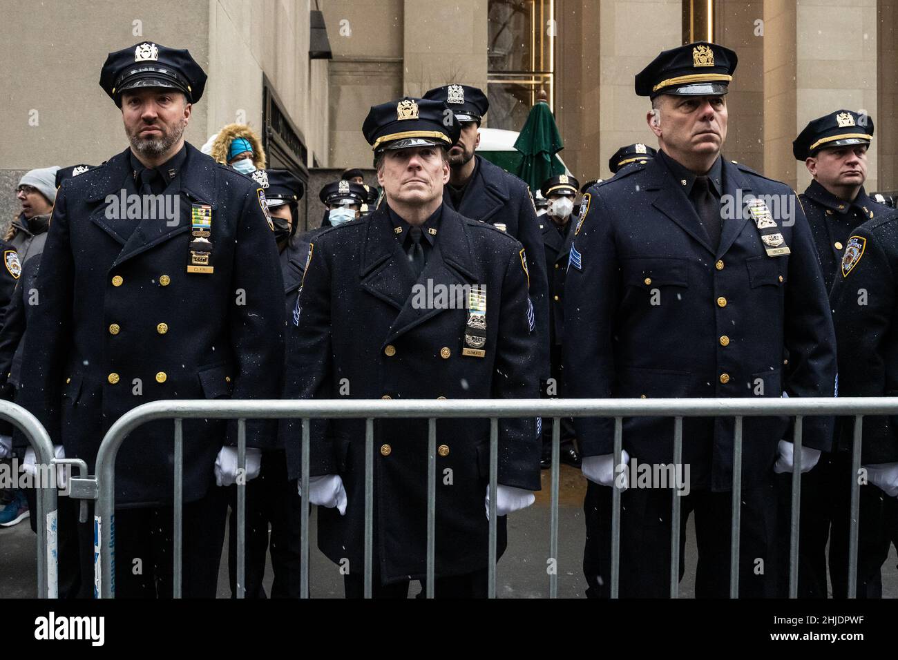 NYPD officers attend the funeral for their fallen colleague, NYPD ...