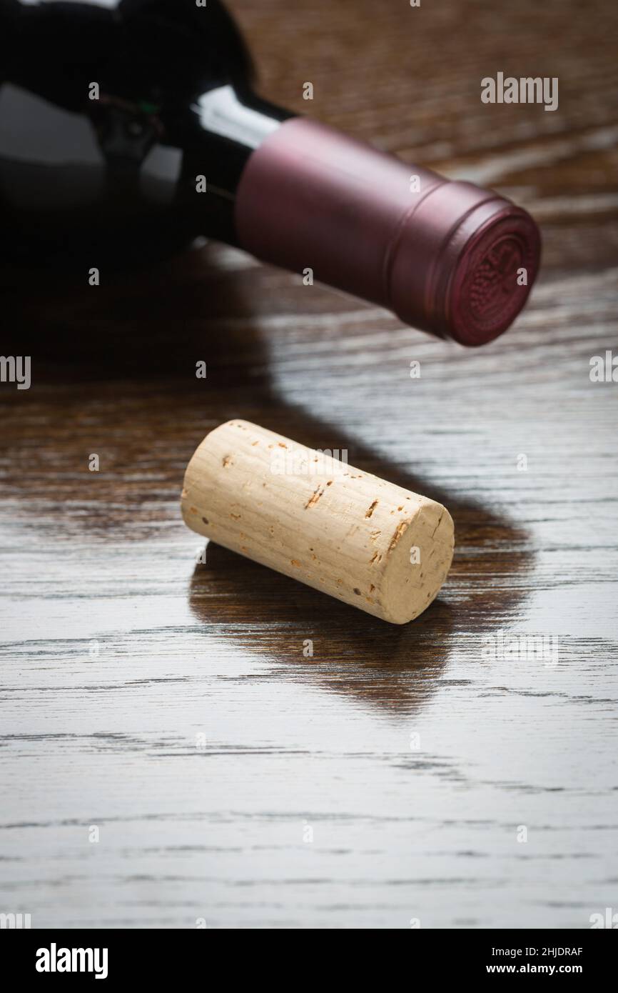 Wine Bottle and Cork on a Reflective Wood Surface Abstract Stock Photo ...
