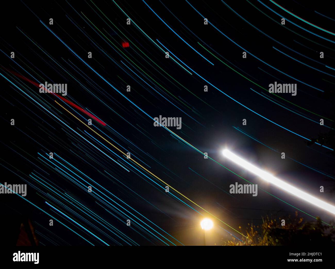 Dark black background with colorful light strobes Stock Photo - Alamy