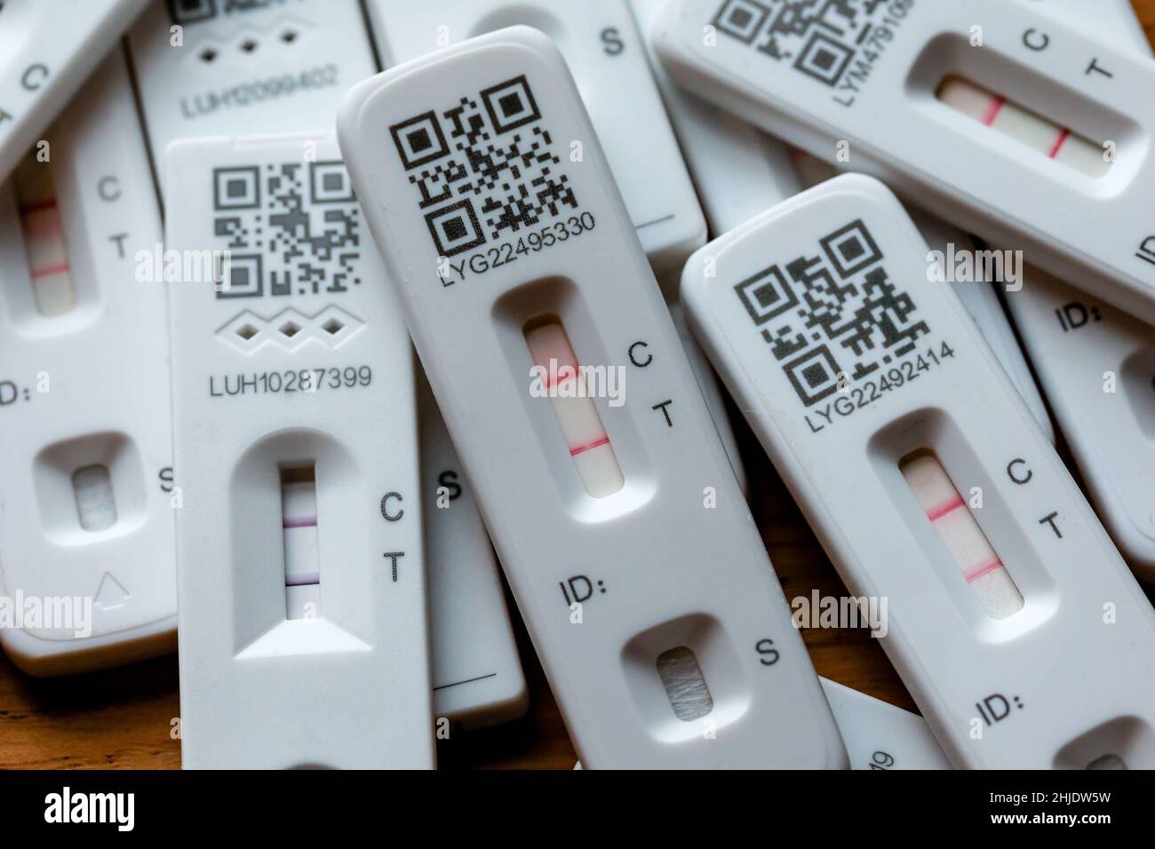 Stack of positive Covid-19 NHS rapid home lateral flow tests Stock ...