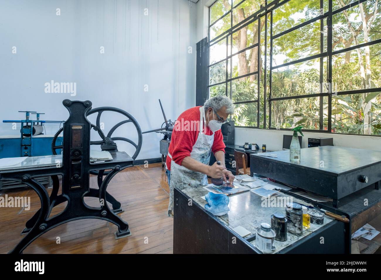 Artist working in a lithography & printing studio, Lasar Segall Museum ...
