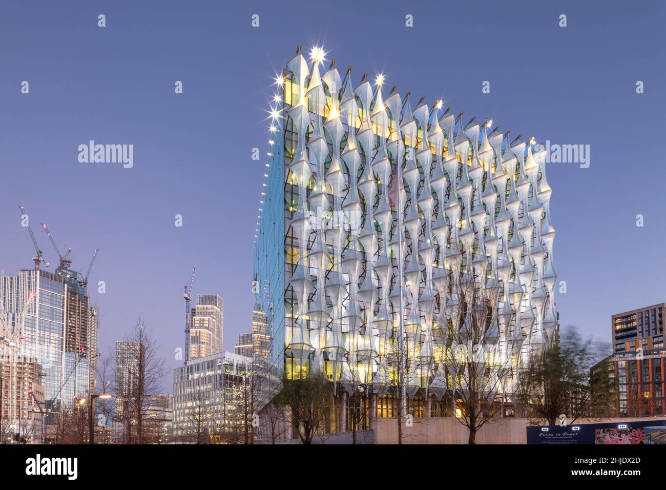 Illuminated facade of U.S Embassy in London with ongoing construction ...