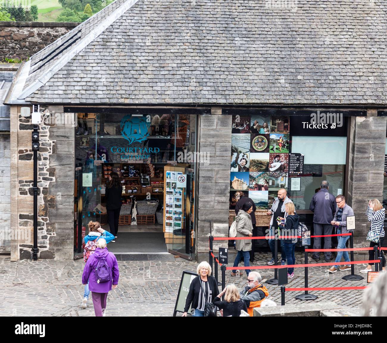 Visitors around the ticket desk and the Courtyard Giftshop of Stirling ...