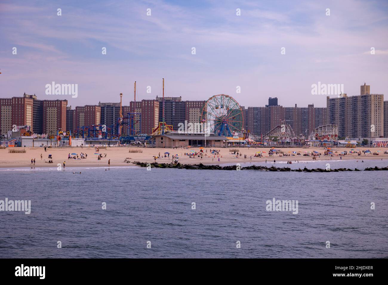 Scenic shot of the Coney Island with the amusement park, and buildings ...