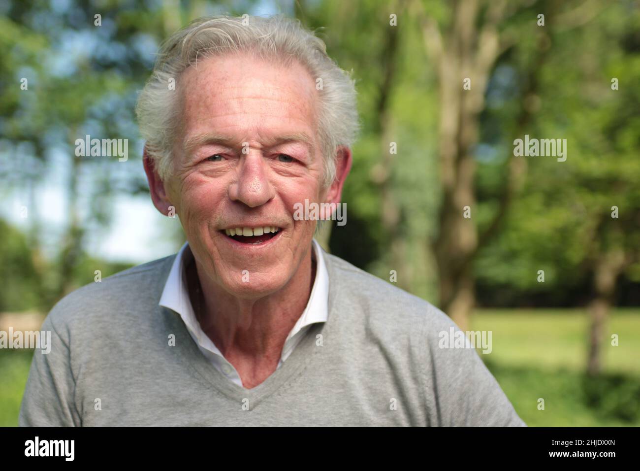 Beautiful old man outside Stock Photo - Alamy