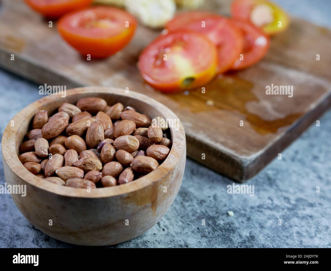 beans in a small wooden bowl. concept cooking recipe Stock Photo - Alamy