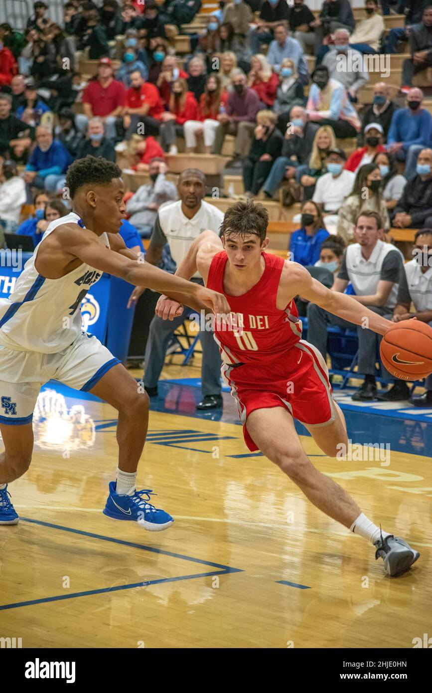Jack McCloskey #10 of Mater Dei dribbles the ball up to court as ...