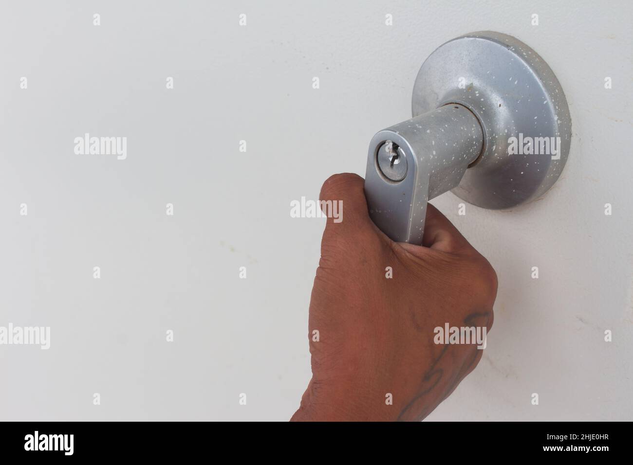 Door knob hand hi-res stock photography and images - Alamy Door knob hand hi-res stock photography and images - Alamy