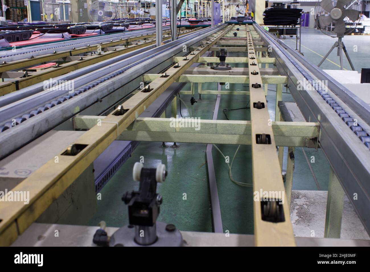 The chain and shaft drive Line Conveyor Stock Photo - Alamy