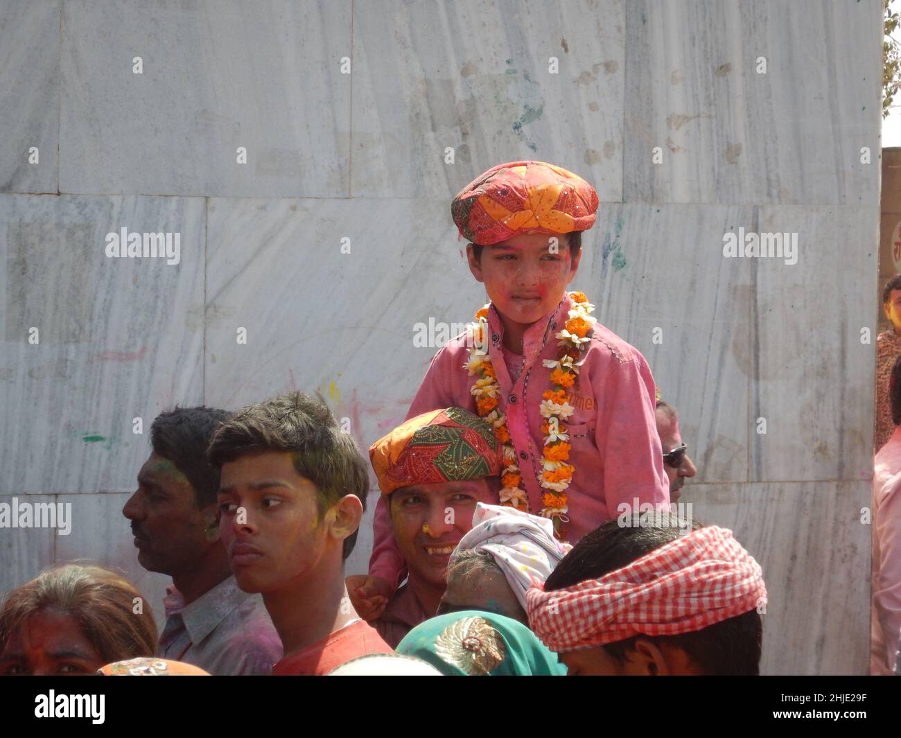 People during famous Holi festival at Nandgaon in the state of Uttar ...