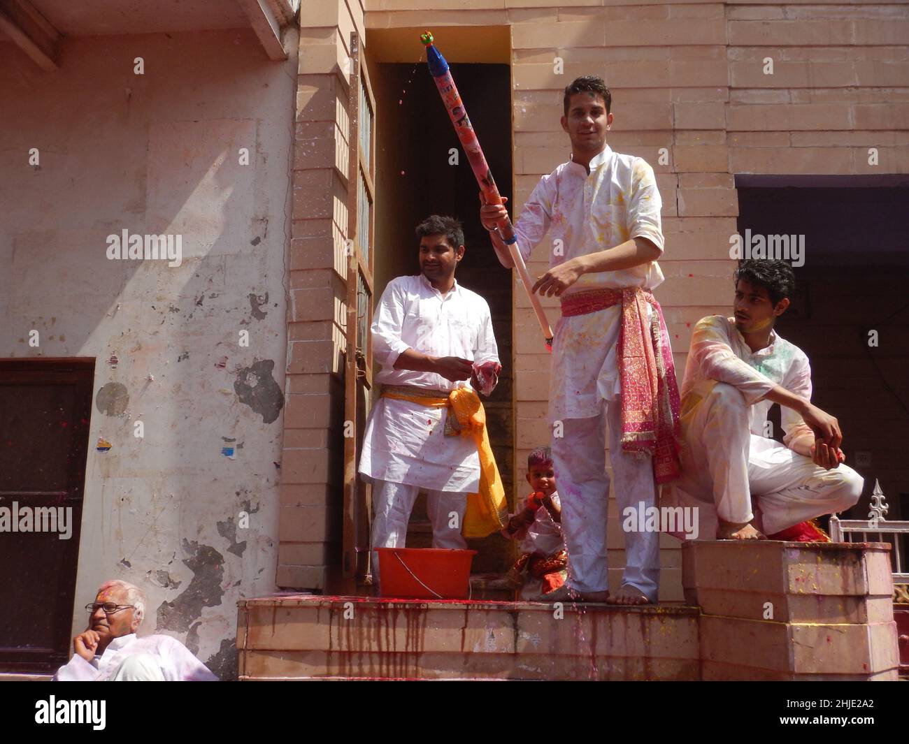 People during famous Holi festival at Nandgaon in the state of Uttar ...