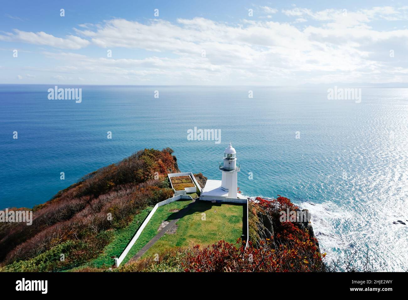 Lighthouse and ocean with blue sky at cape Chikyu Hokkaido Japan Stock Photo - Alamy