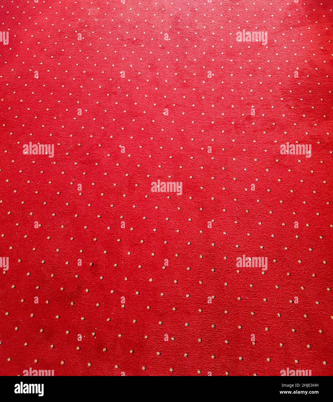 Close-up of the texture of the red carpet on the floor, background ...
