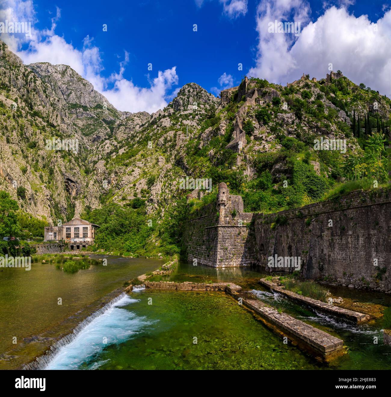 Emerald green waters of Kotor Bay or Boka Kotorska, mountains and the ...