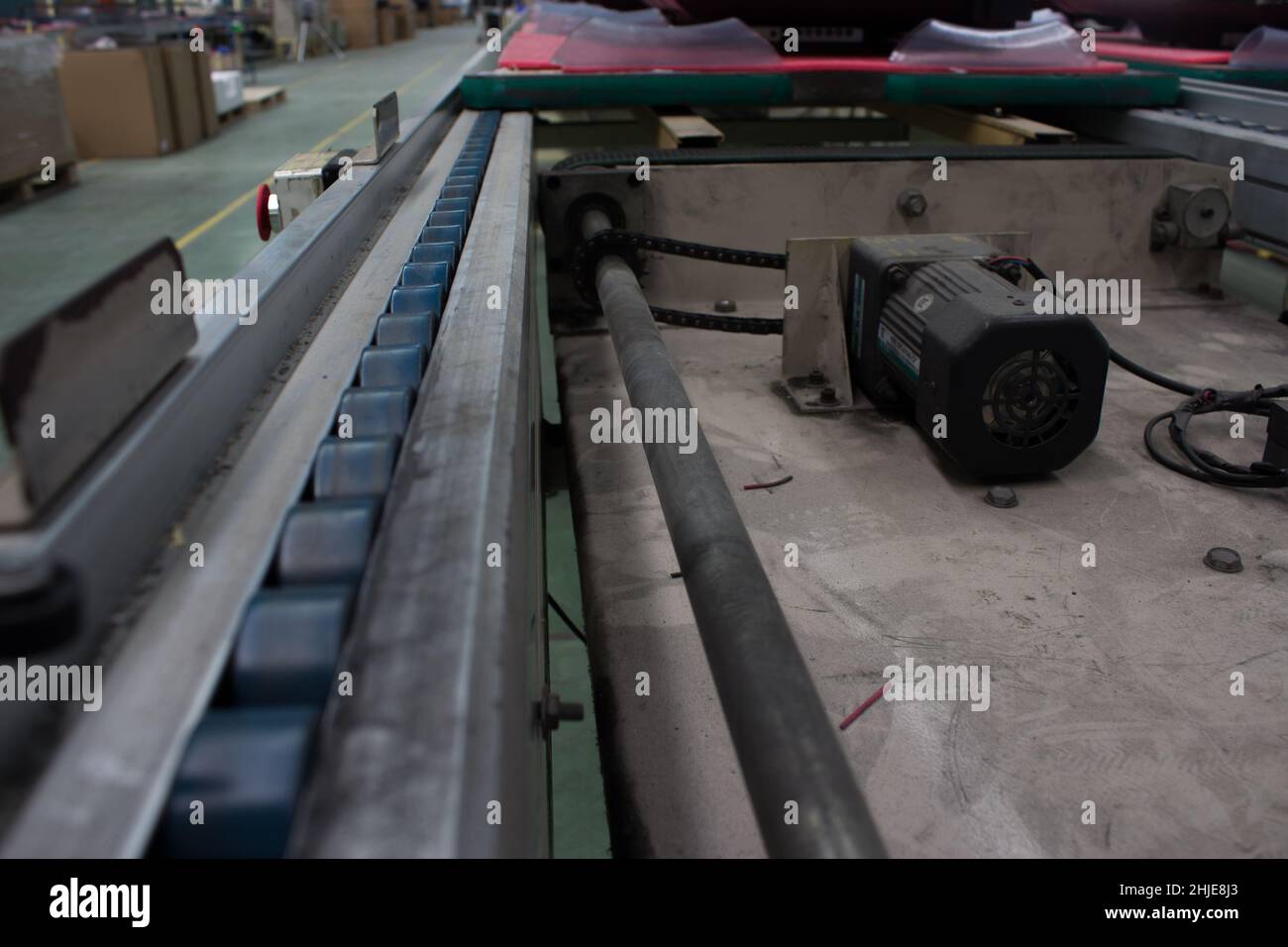 The chain and shaft drive Line Conveyor Stock Photo - Alamy