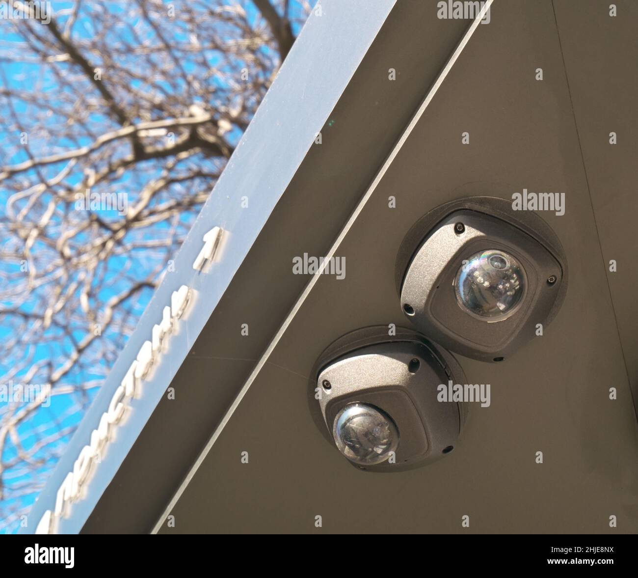 Camera surveillance. Surveillance camera at a bus stop Stock Photo - Alamy