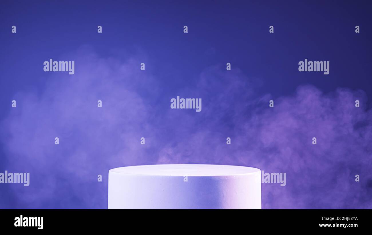 White cylinder podium with smoke in the periwinkle blue color of 2022 ...