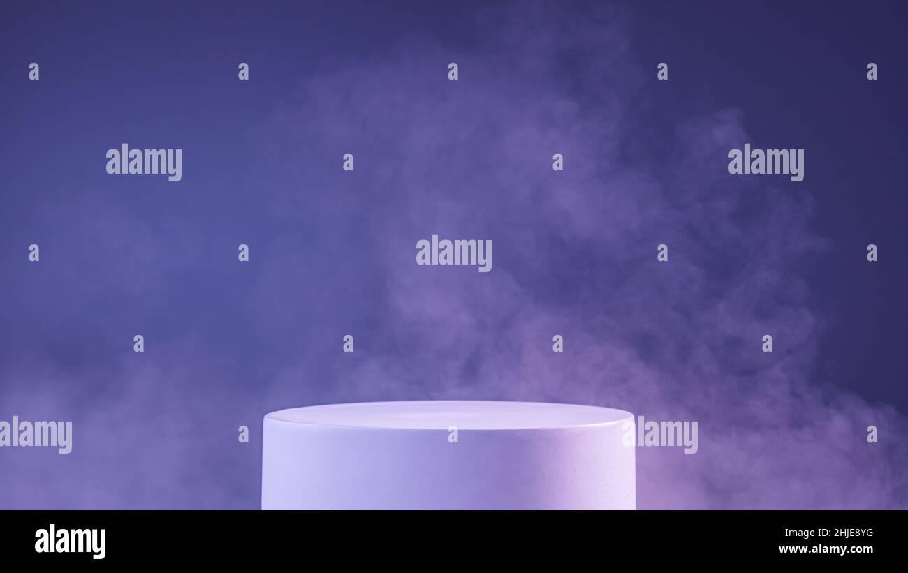 White cylinder podium with smoke in the periwinkle blue color of 2022 ...