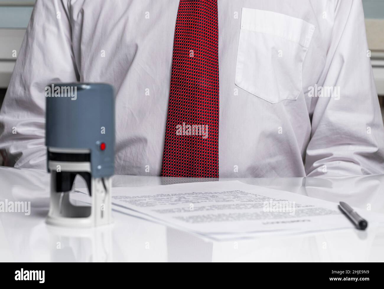 Contract stamping. Businessman or lawyer and rubber stamp Stock Photo ...