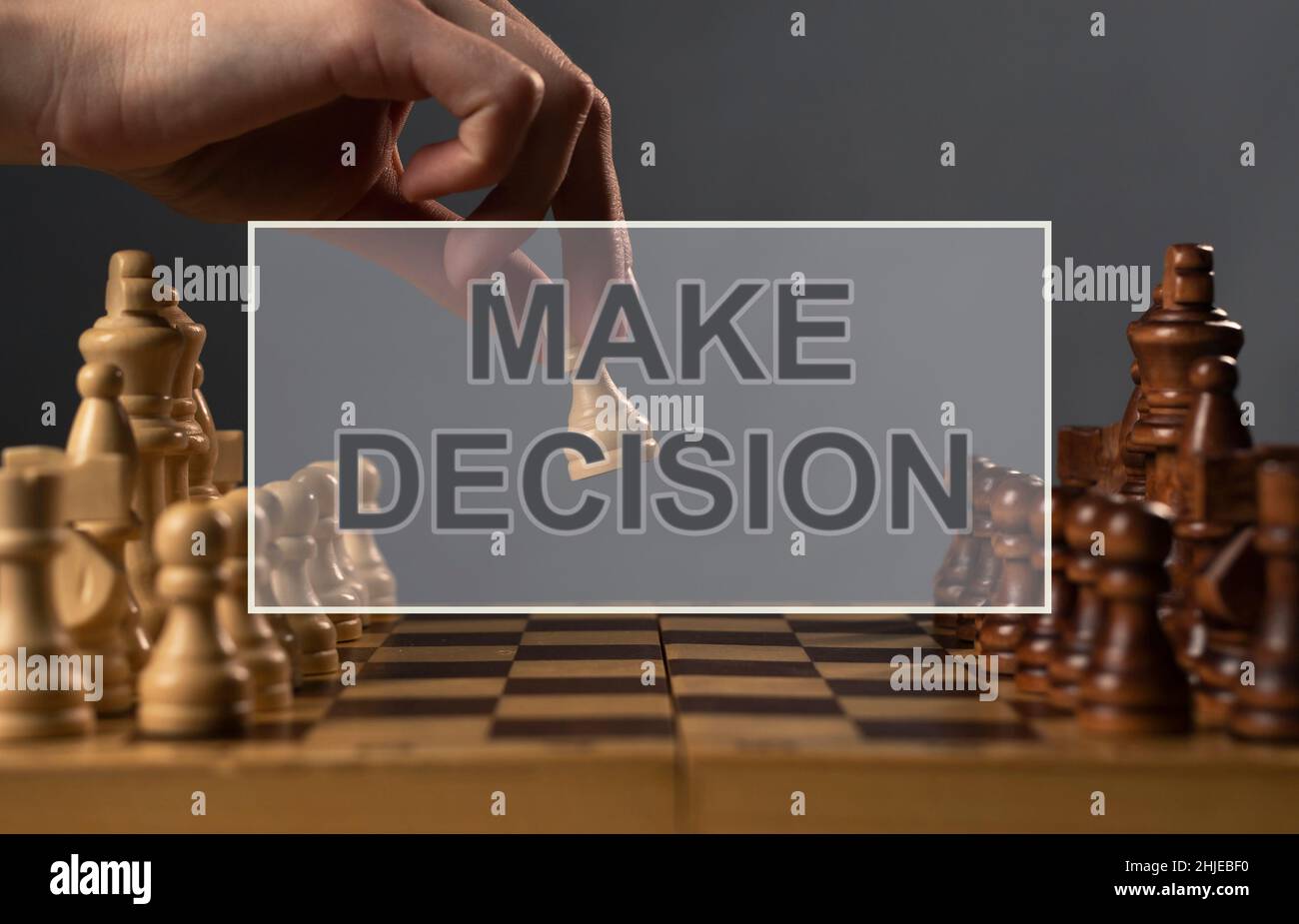 Make Decision text on photo with pawn making first step Stock Photo - Alamy
