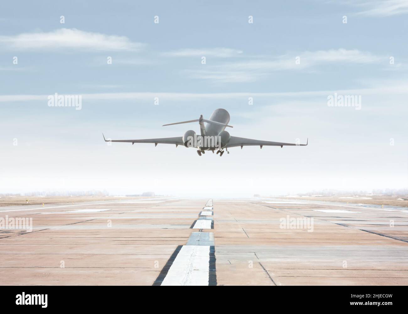 Modern corporate business jet take off from airport runway Stock Photo ...