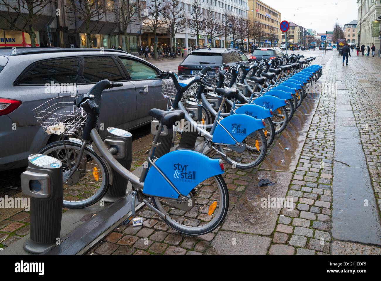 GOTEBORG, SWEDEN - DECEMBER 23, 2019: Row of blue rental bikes ik the ...