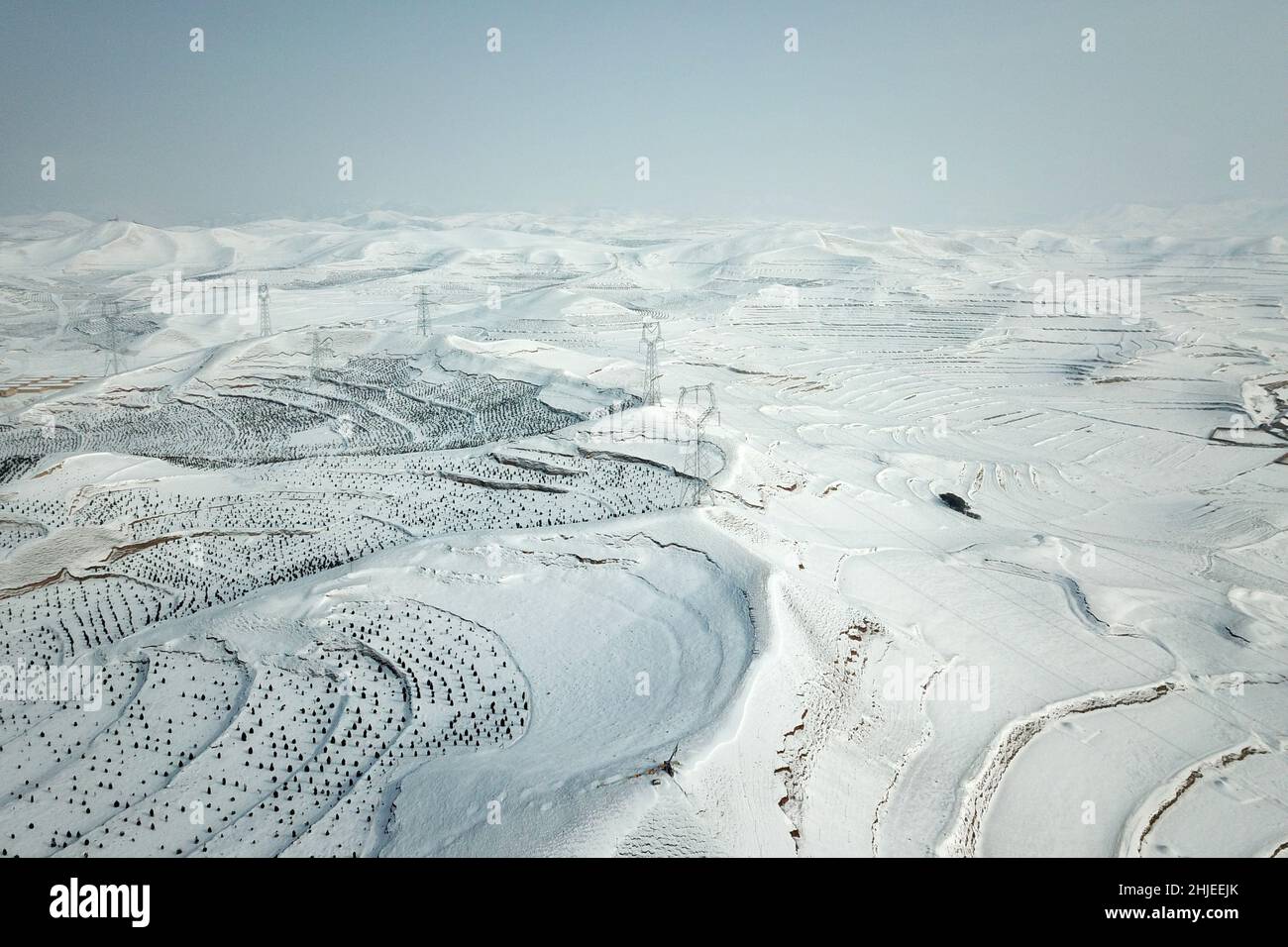 Gansu. 28th Jan, 2022. Aerial photo taken on Jan. 28, 2022 shows snow ...