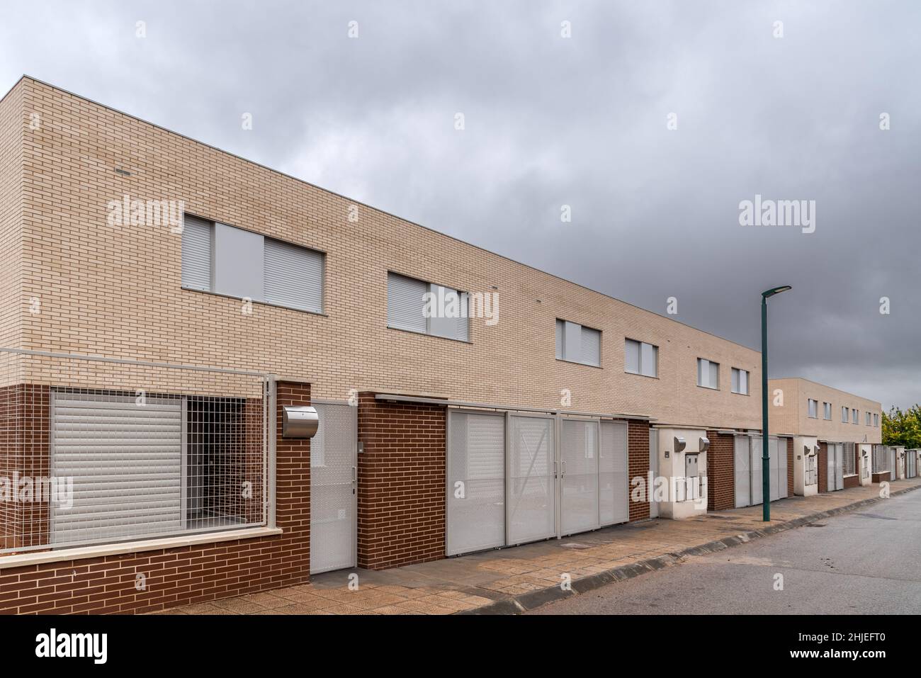 Contemporary row houses with brick facade. Real Estate and realty ...