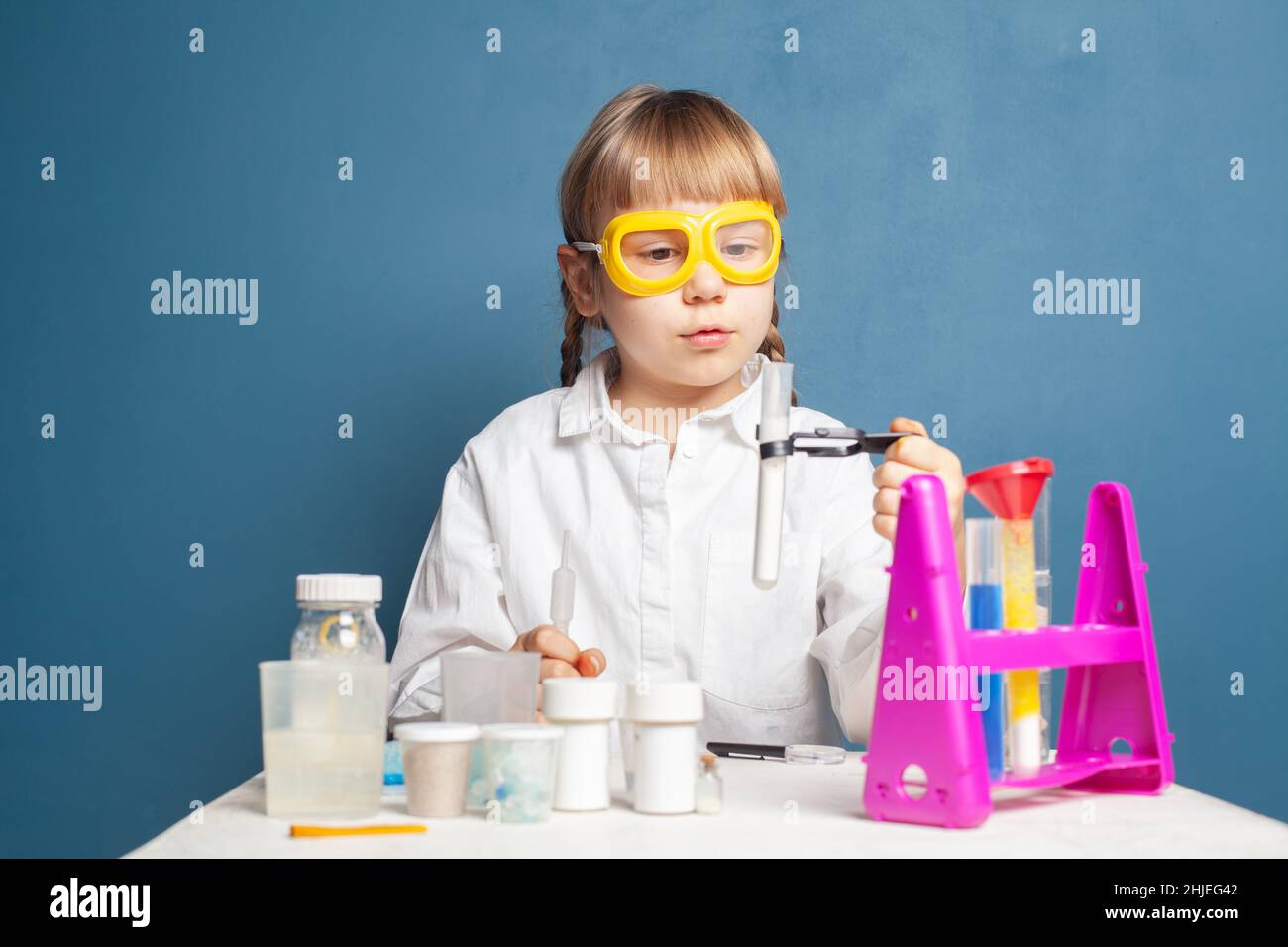 Curious student girl learning science. Child learning science Stock ...