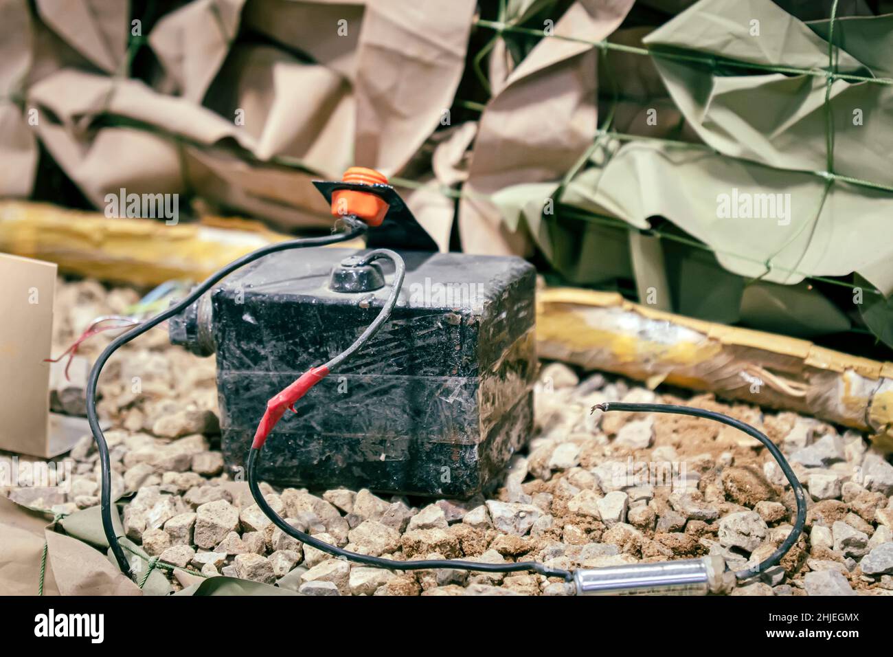 a homemade bomb on the ground. Clearance of terrorist bombs Stock Photo ...