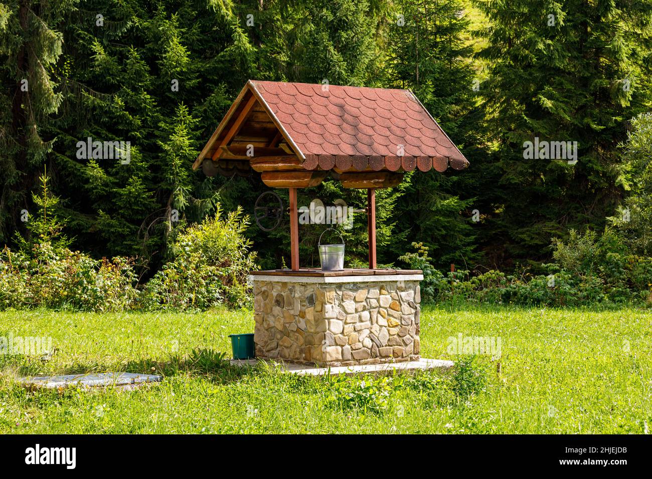 water fountain in a Village of Moldovita in the Bucovina in Romania ...