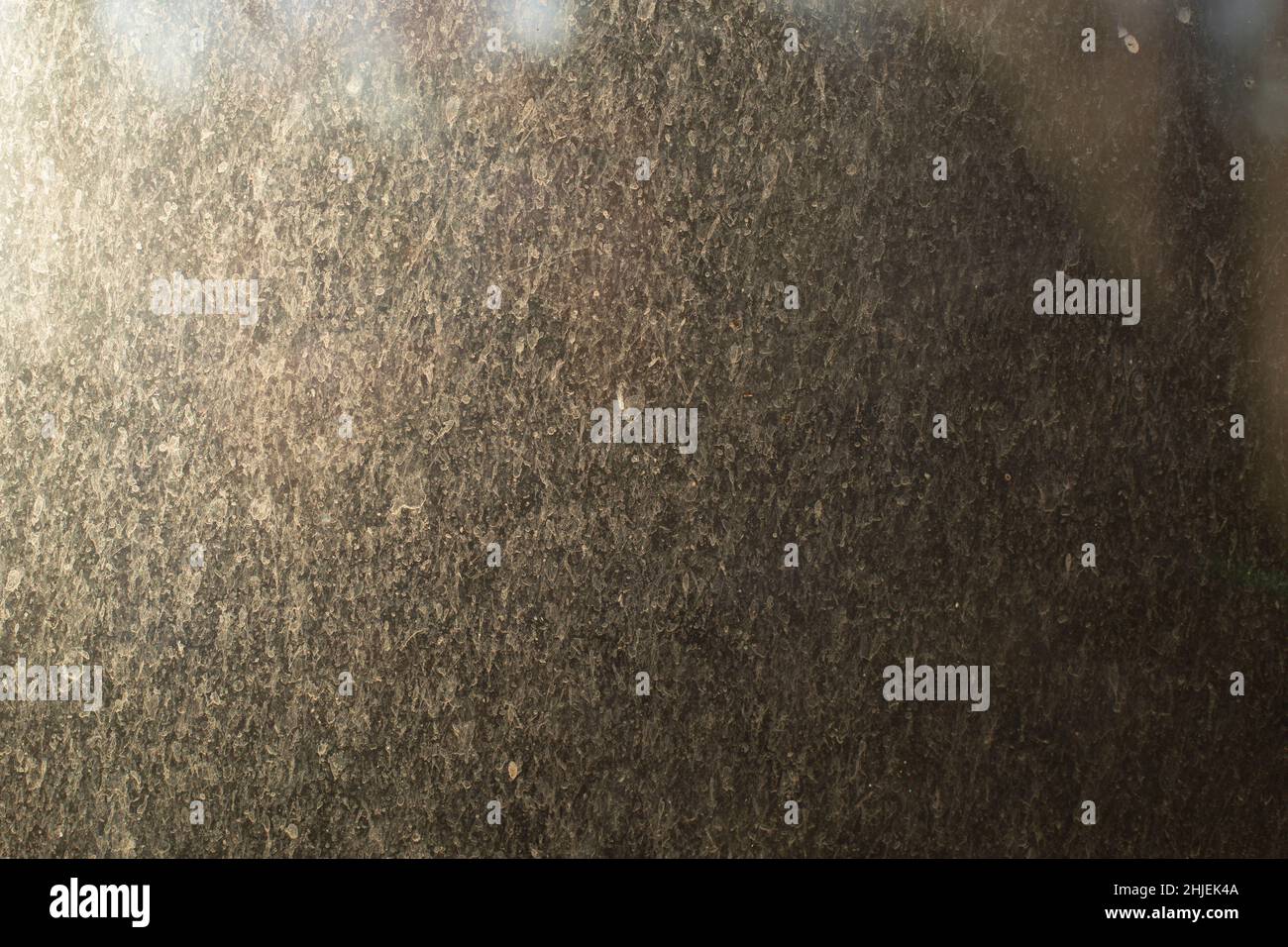 Dirty window. Surface of glass. Plaque on window. Lots of fine dust ...