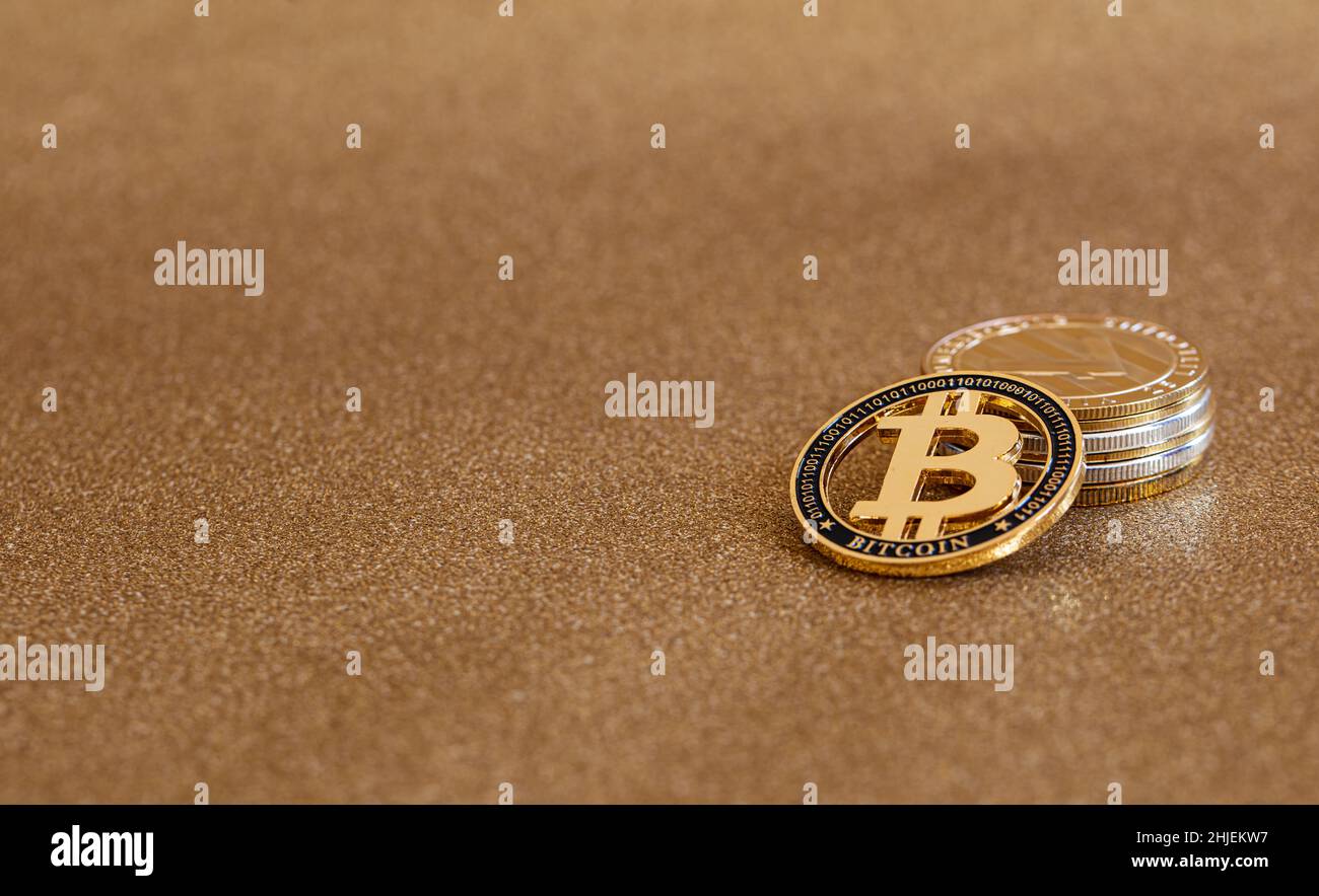 bitcoin on golden background for design purpose Stock Photo - Alamy