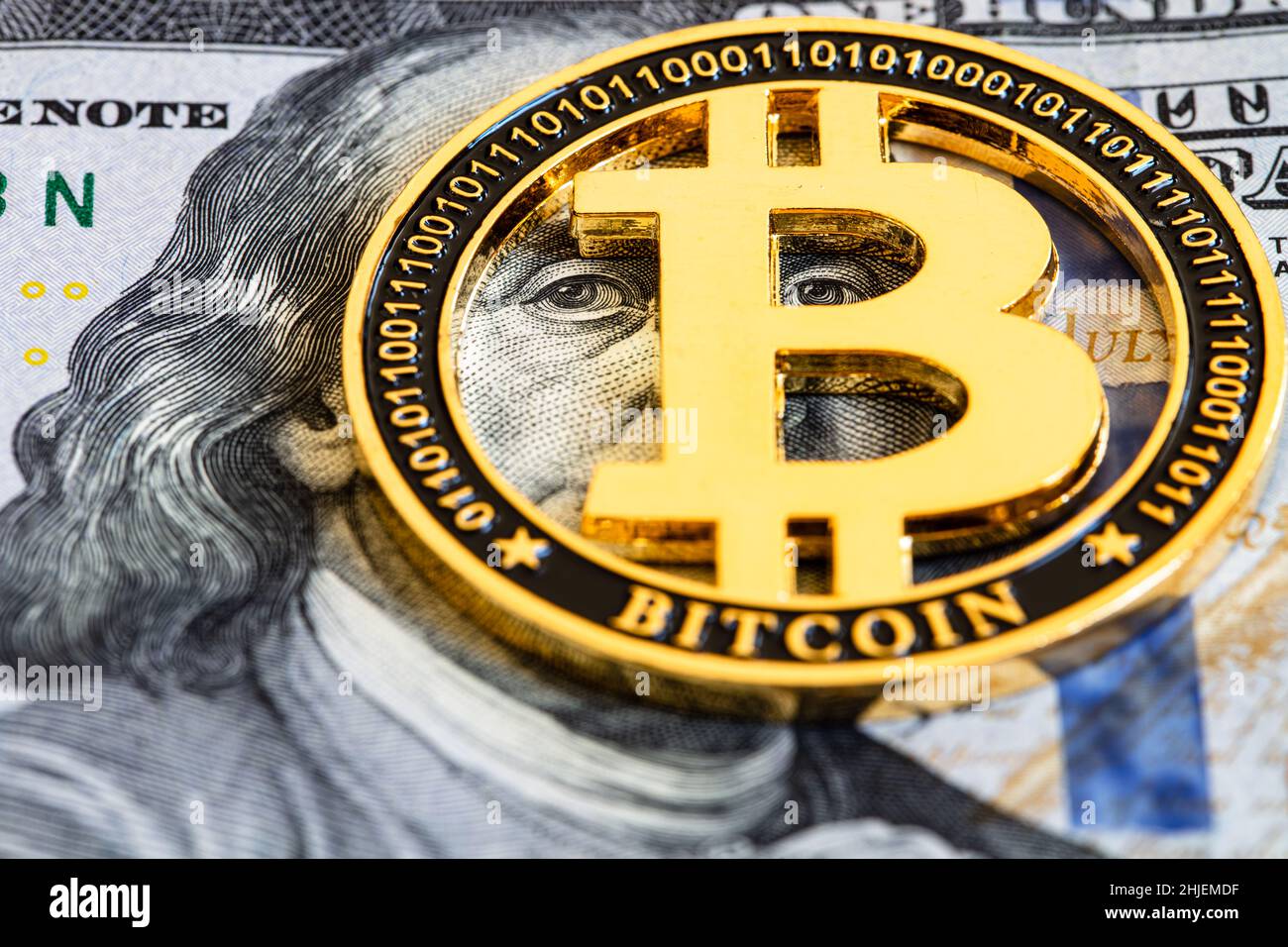 Bitcoin on 100 dollar bill background for design purpose Stock Photo ...