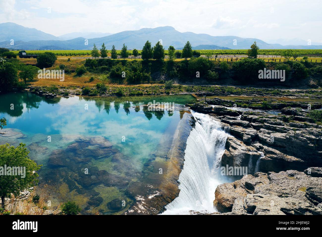 Famous Montenegro Niagara fall, transparent river stream and mountains ...