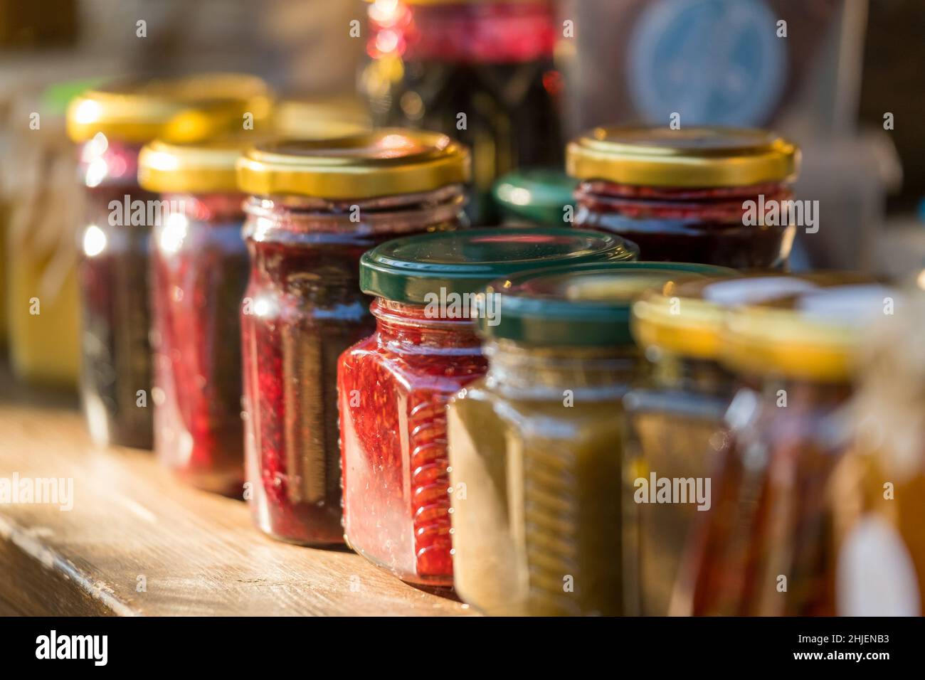 Jars with assorted jams on stall Stock Photo - Alamy