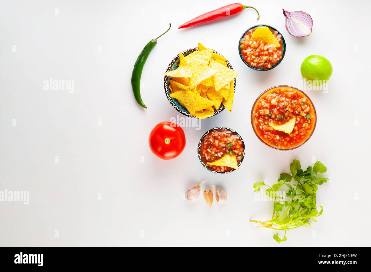 Traditional mexican salsa sauce with ingredients on white background ...