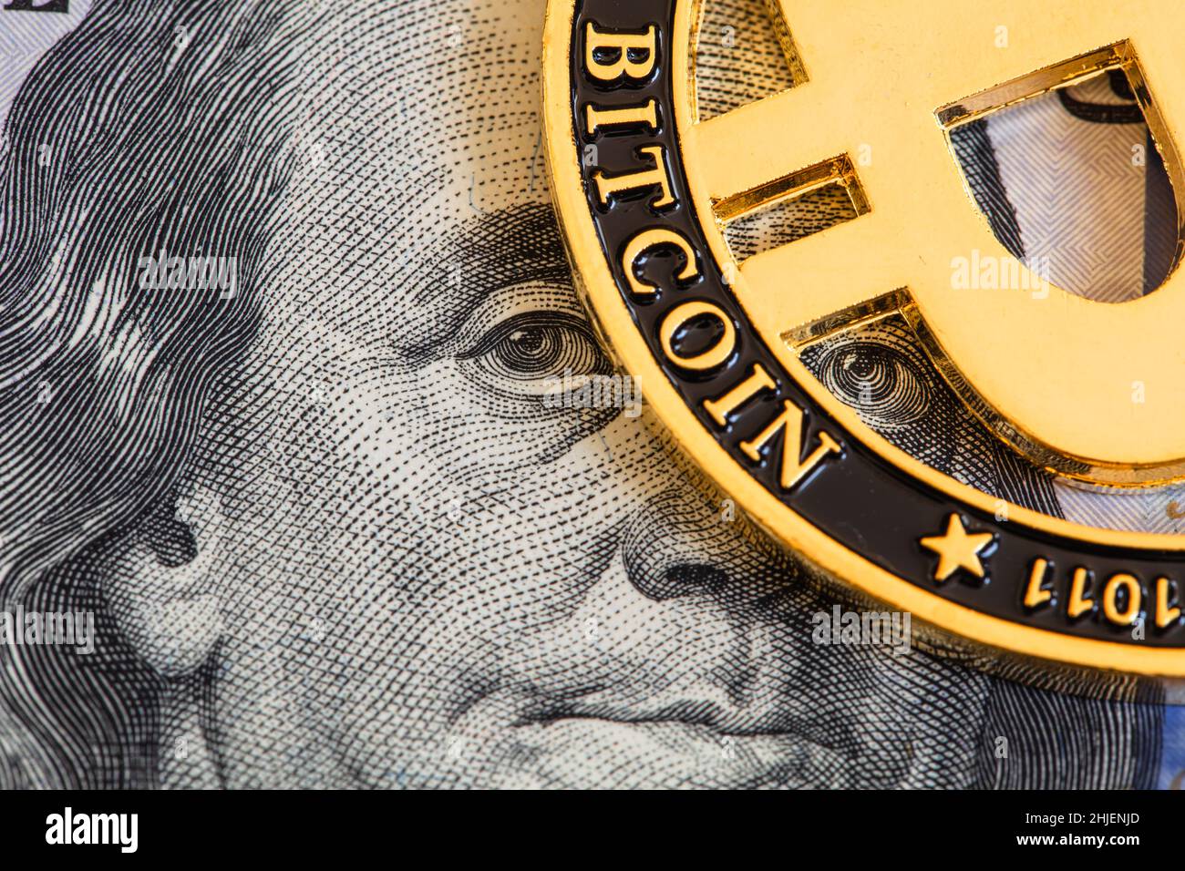 Bitcoin on 100 dollar bill background for design purpose Stock Photo ...