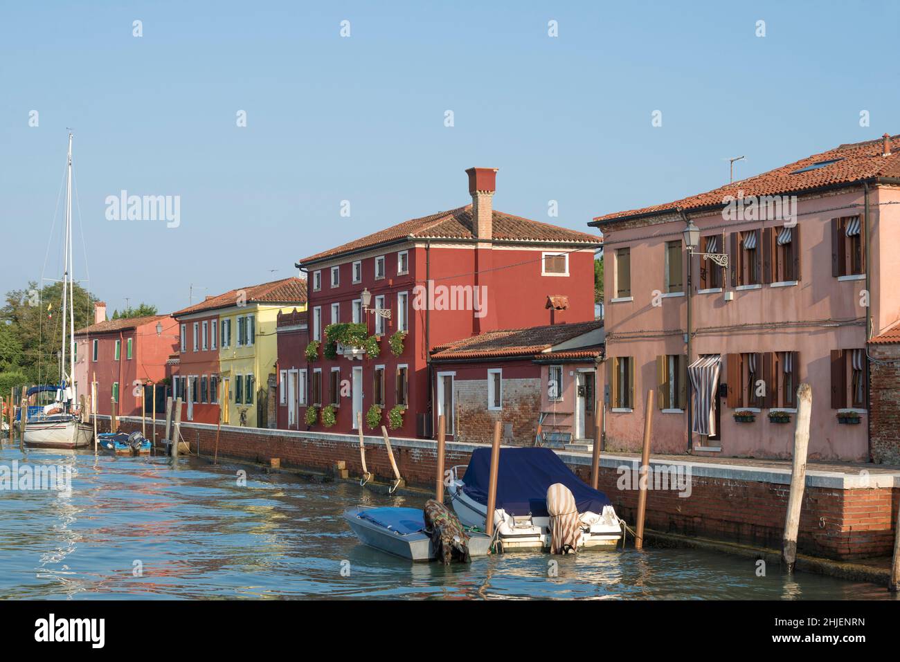 The ancient waterfront of Mazzorbo island on a September afternoon ...