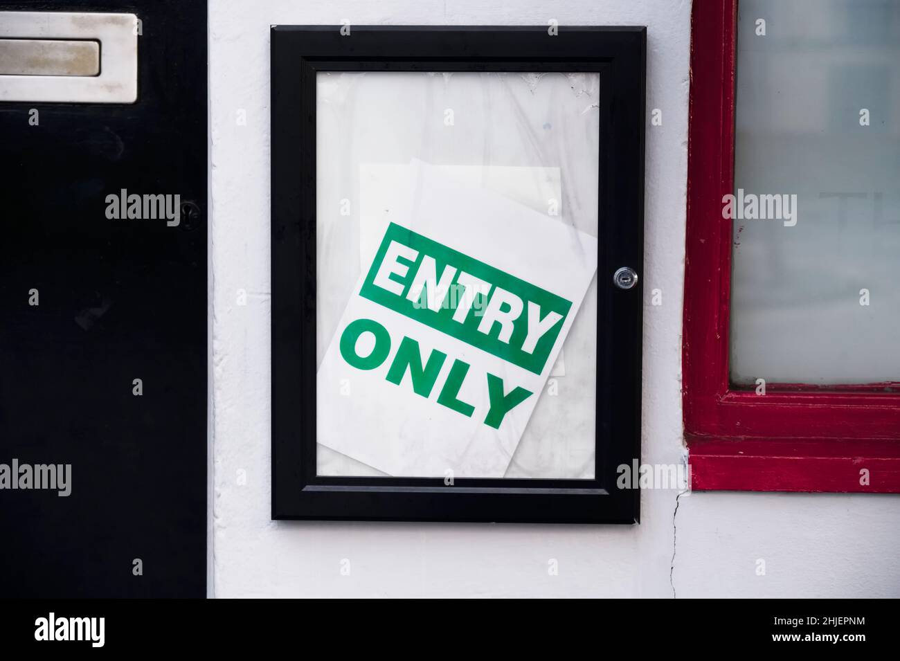 Entry only sign at pub and bar restaurant on wall Stock Photo - Alamy