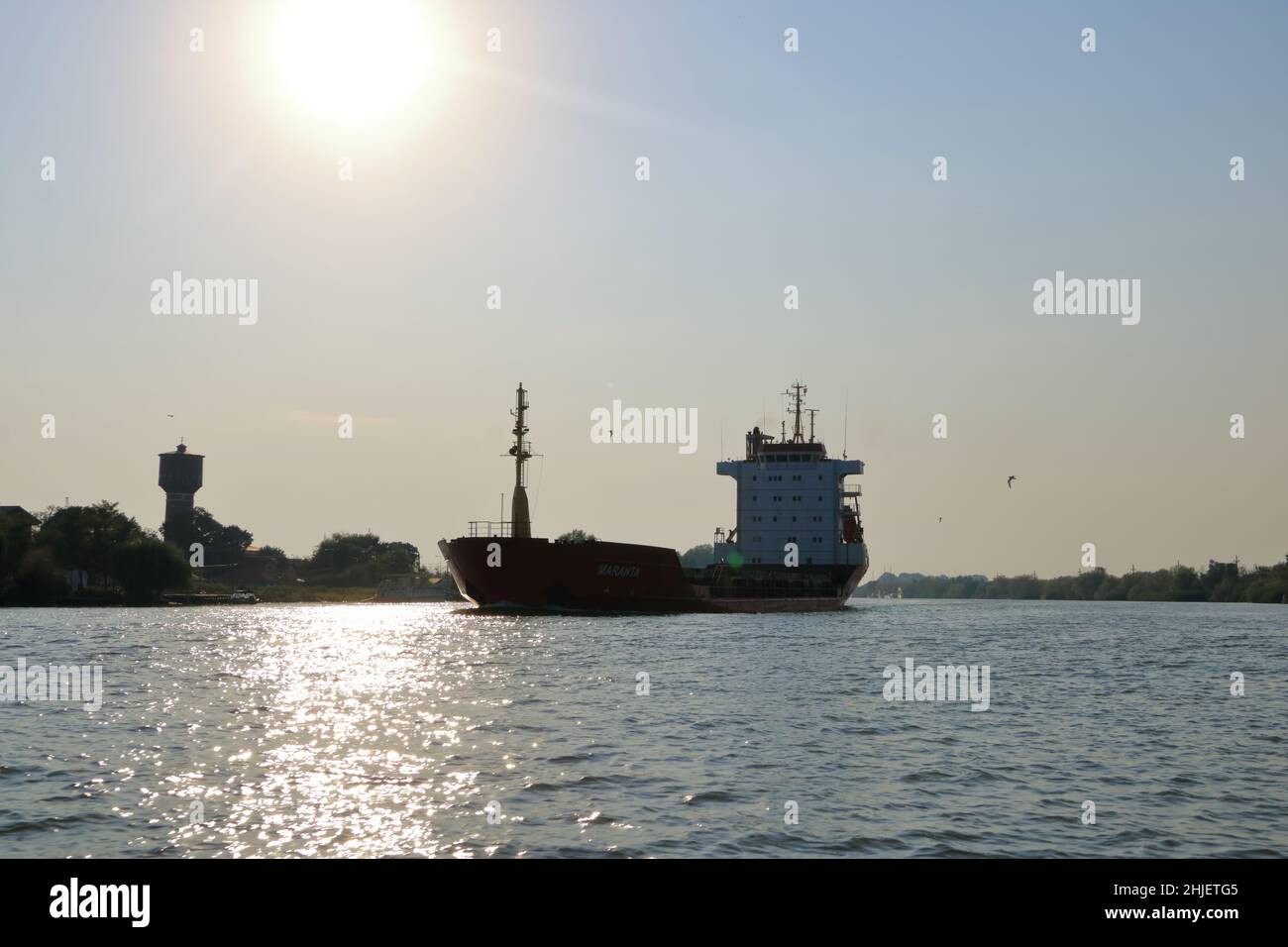 Large cargo ship in the Danube Delta Stock Photo - Alamy