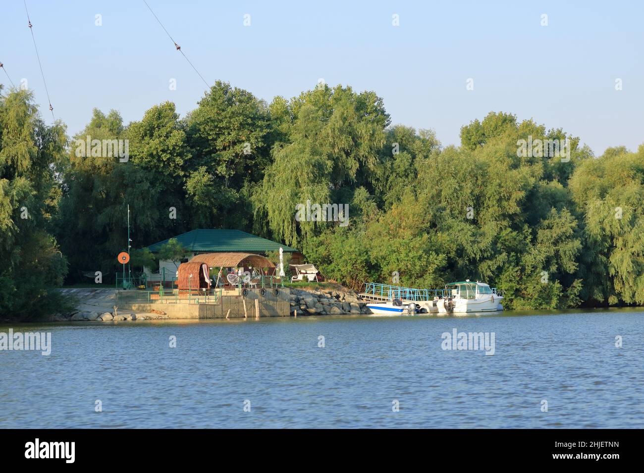Boat for tourists in Danube Delta in Romania Stock Photo - Alamy